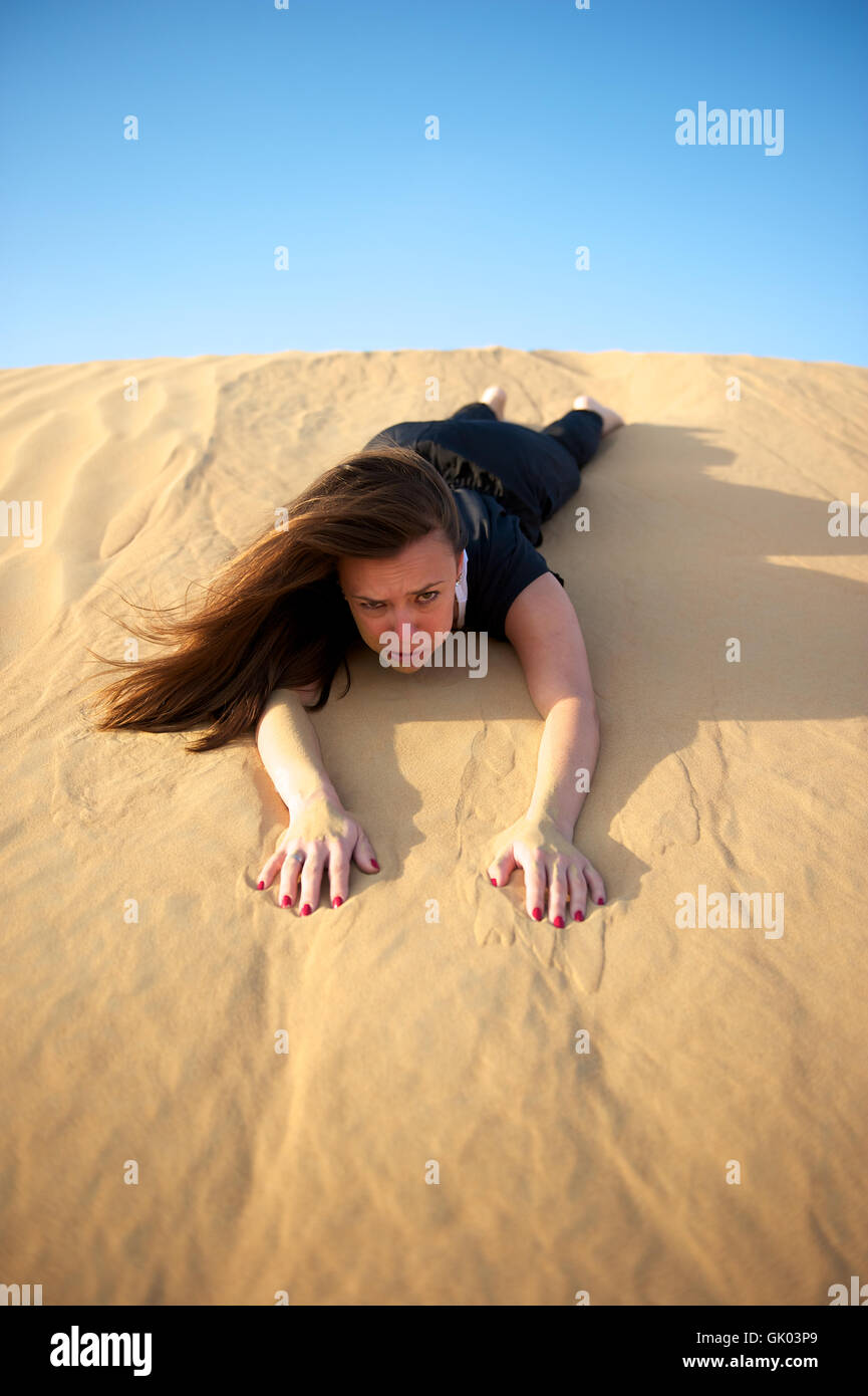 Woman in the desert Stock Photo - Alamy