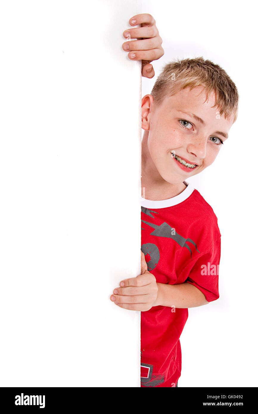 boy looks around the corner 280610-1 Stock Photo - Alamy