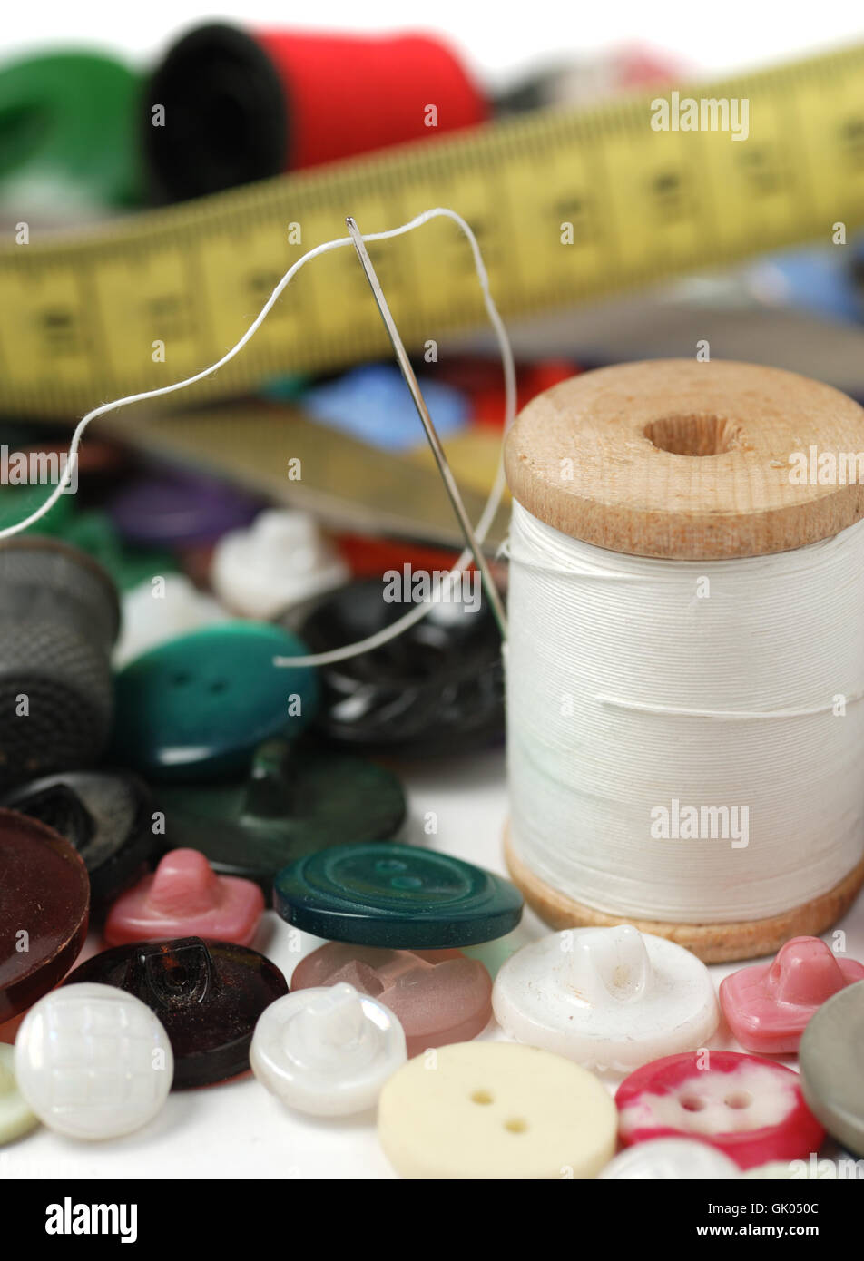 Needle and a thread Stock Photo - Alamy