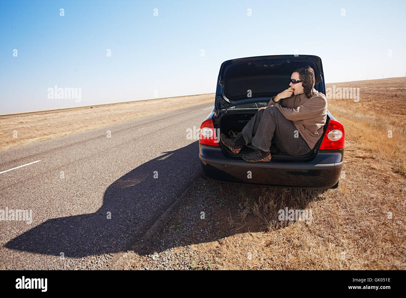 Black car sun hi-res stock photography and images - Alamy