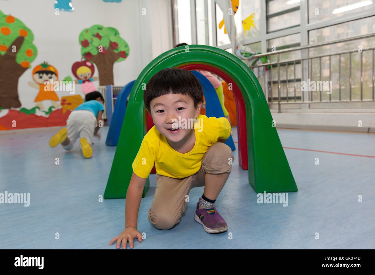 Children playing in kindergarten Stock Photo - Alamy