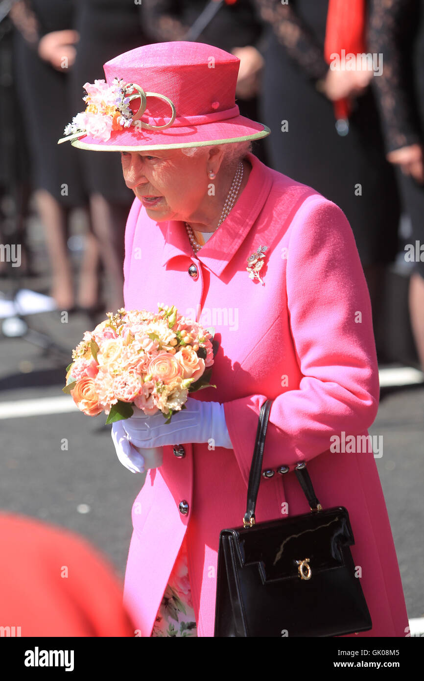 Queen Elizabeth II visits the Royal Mail sorting office in Windsor, one ...