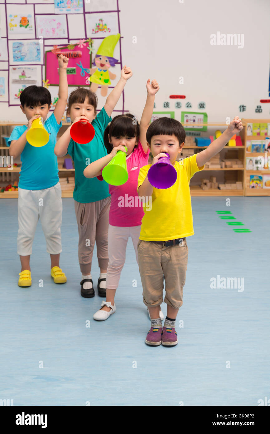 Children playing in kindergarten Stock Photo - Alamy