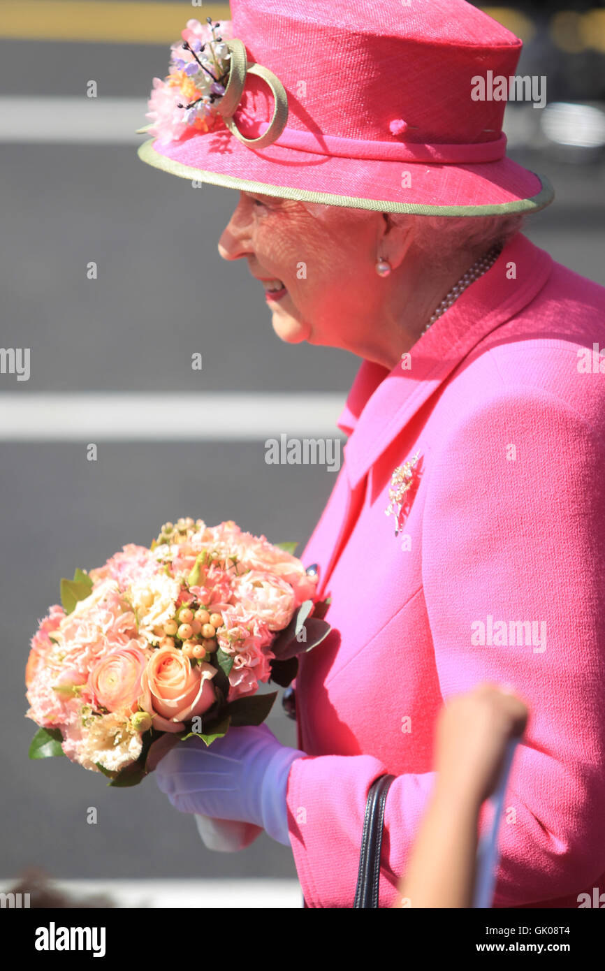 Queen Elizabeth II visits the Royal Mail sorting office in Windsor, one ...