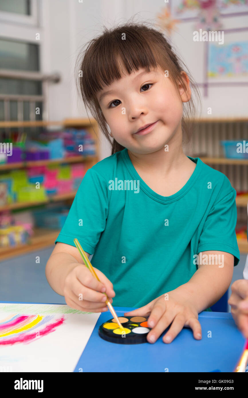 Children playing in kindergarten Stock Photo - Alamy