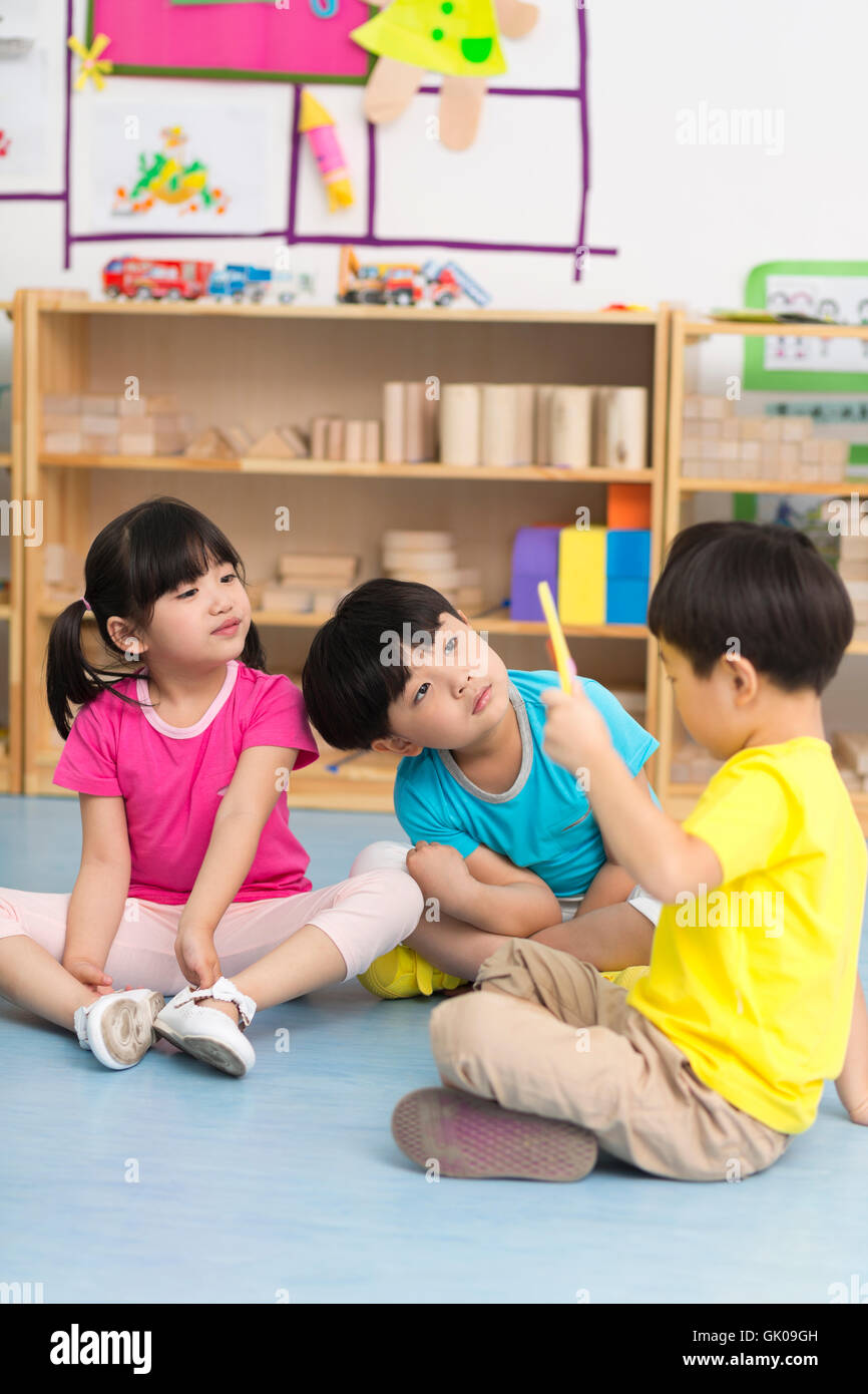 Children playing in kindergarten Stock Photo - Alamy