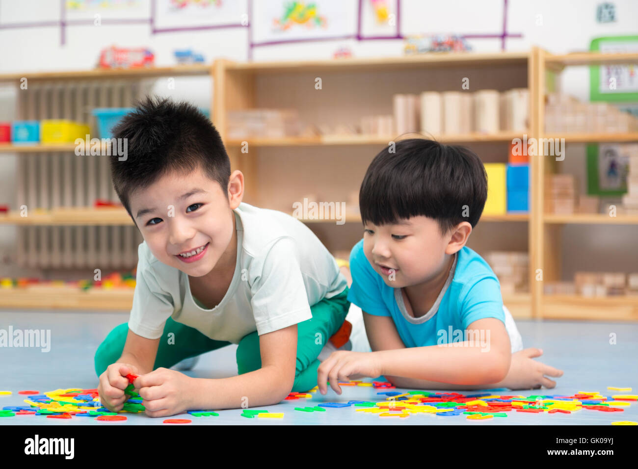 Children playing in kindergarten Stock Photo - Alamy