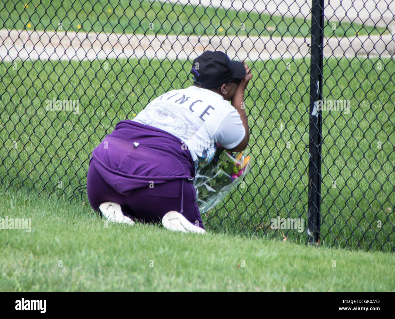Fans pay tribute to Prince outside his Paisley Park estate in ...