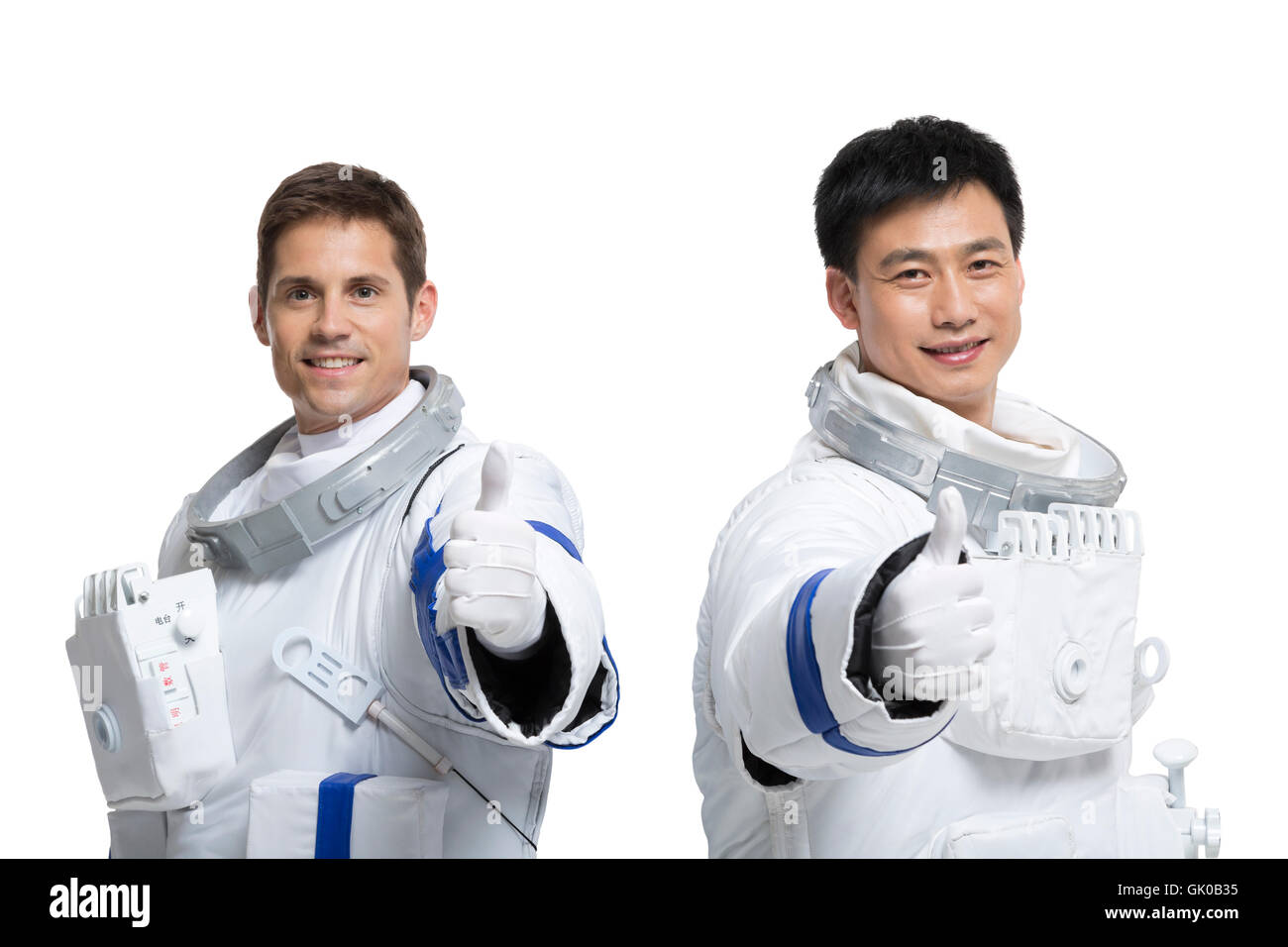 Studio shot two male astronauts Stock Photo - Alamy