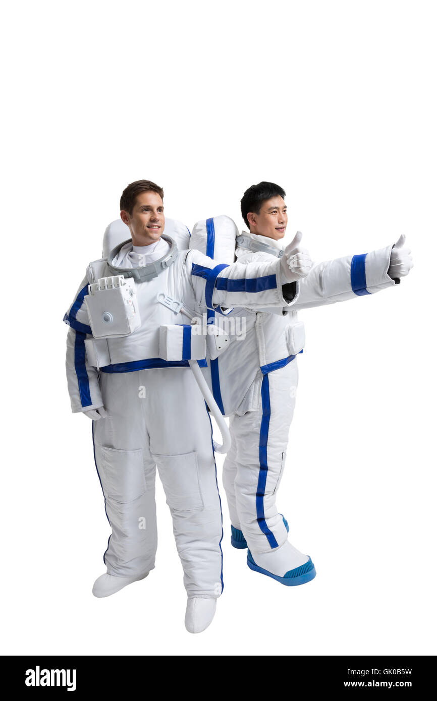 Studio shot two male astronauts Stock Photo - Alamy