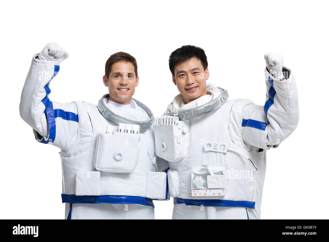 Studio shot two male astronauts Stock Photo - Alamy