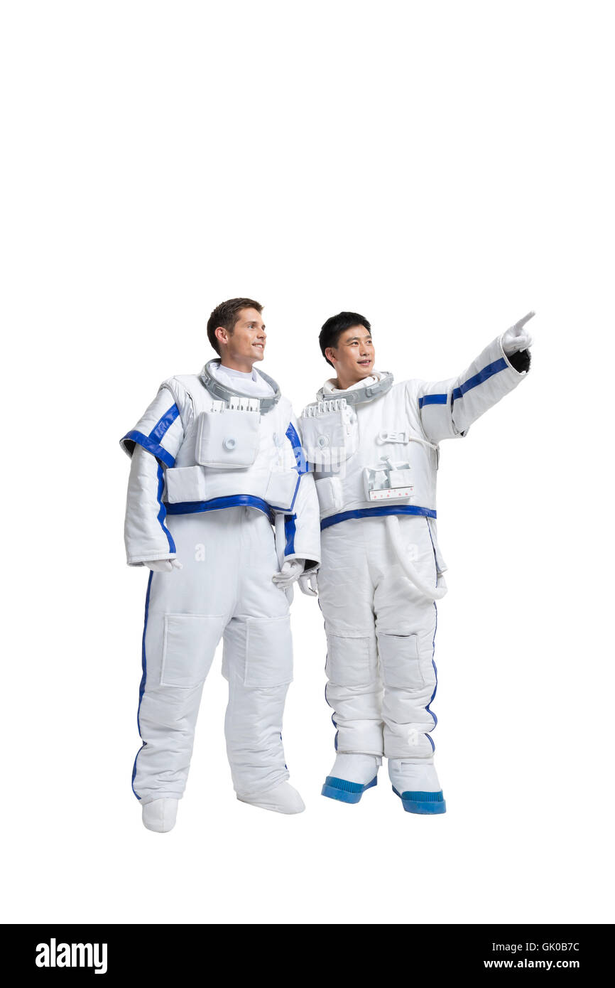 Studio shot two male astronauts Stock Photo - Alamy