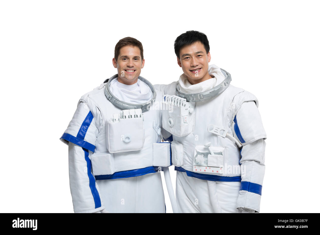 Studio shot two male astronauts Stock Photo - Alamy