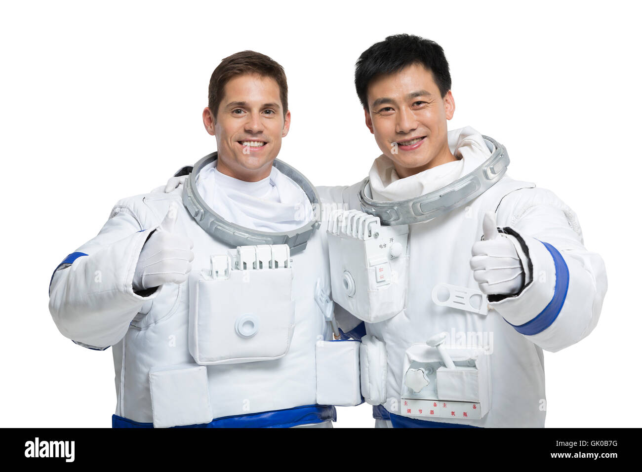 Studio shot two male astronauts Stock Photo - Alamy