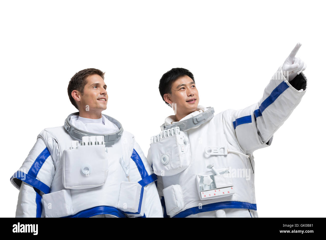 Studio shot two male astronauts Stock Photo - Alamy