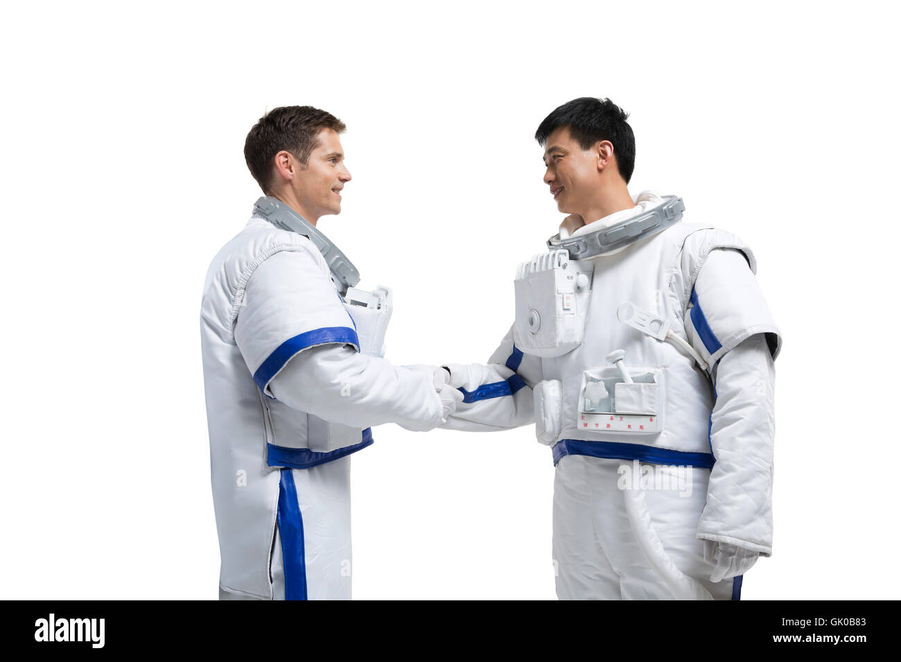Studio shot two male astronauts Stock Photo - Alamy