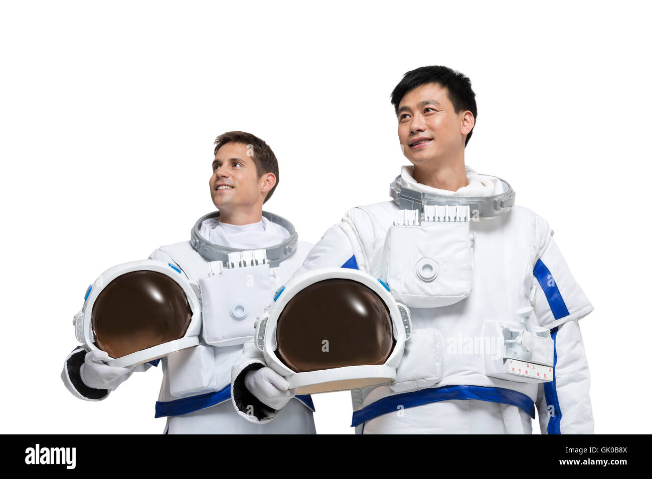 Studio shot two male astronauts Stock Photo - Alamy