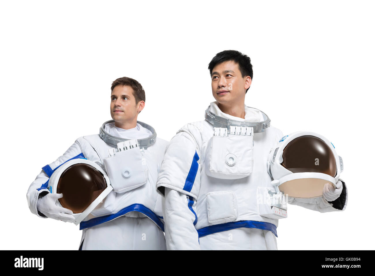 Studio shot two male astronauts Stock Photo - Alamy