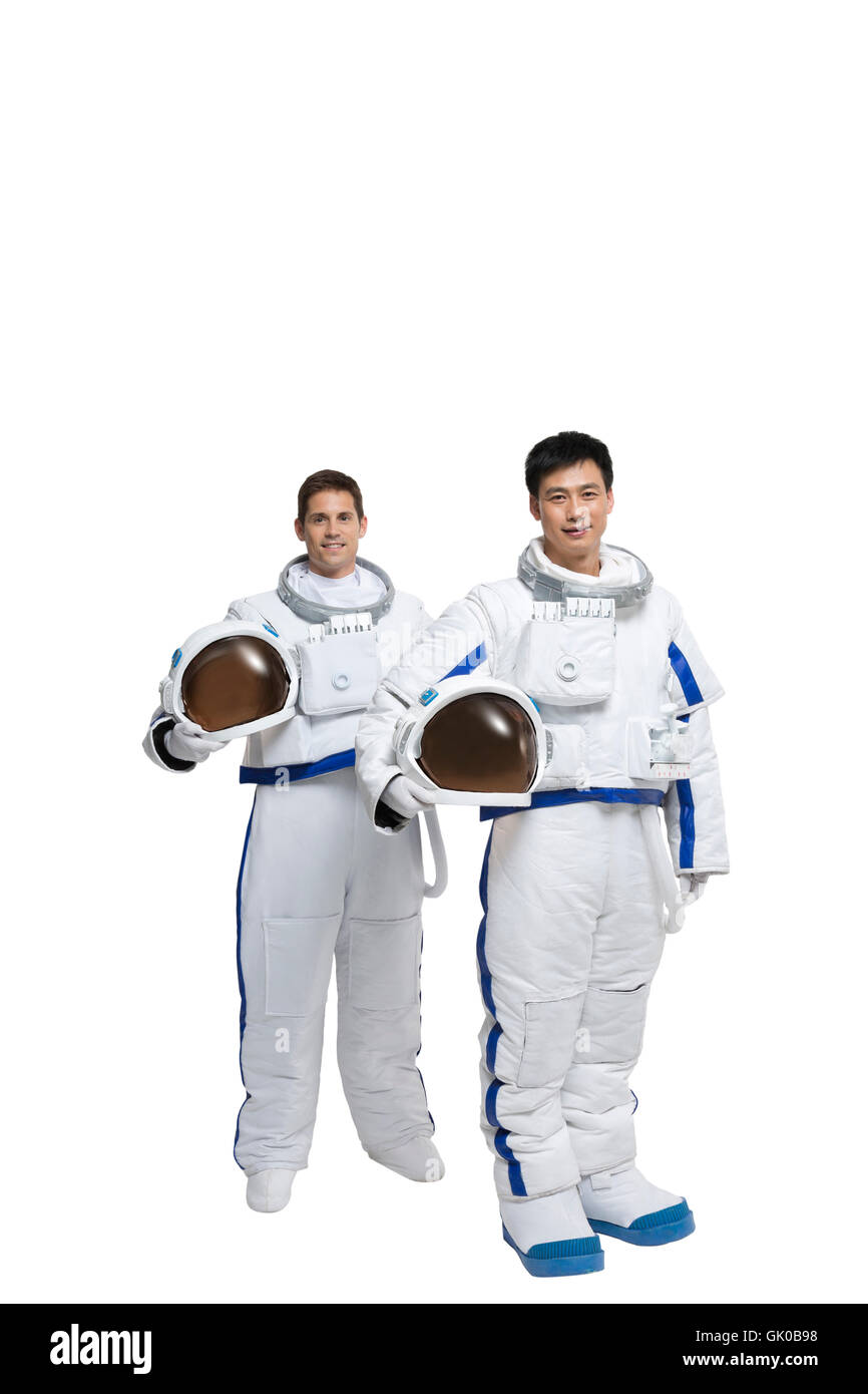 Studio shot two male astronauts Stock Photo - Alamy
