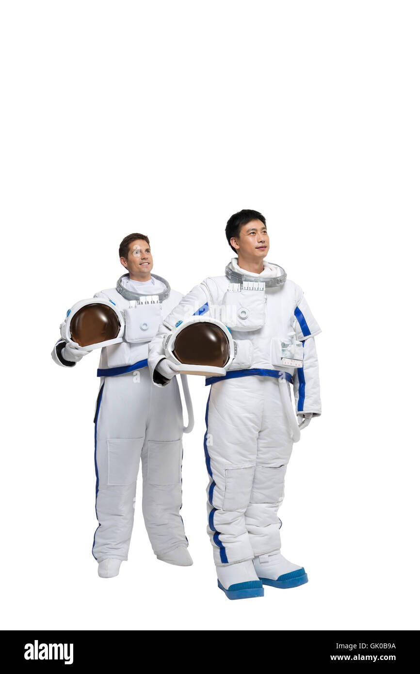 Studio shot two male astronauts Stock Photo - Alamy