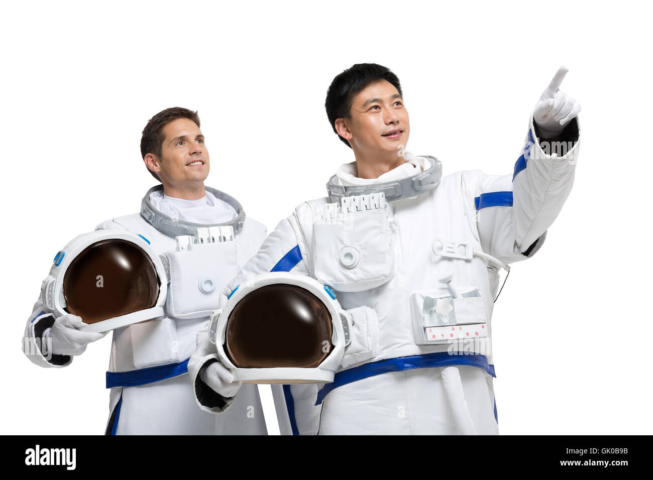 Studio shot two male astronauts Stock Photo - Alamy