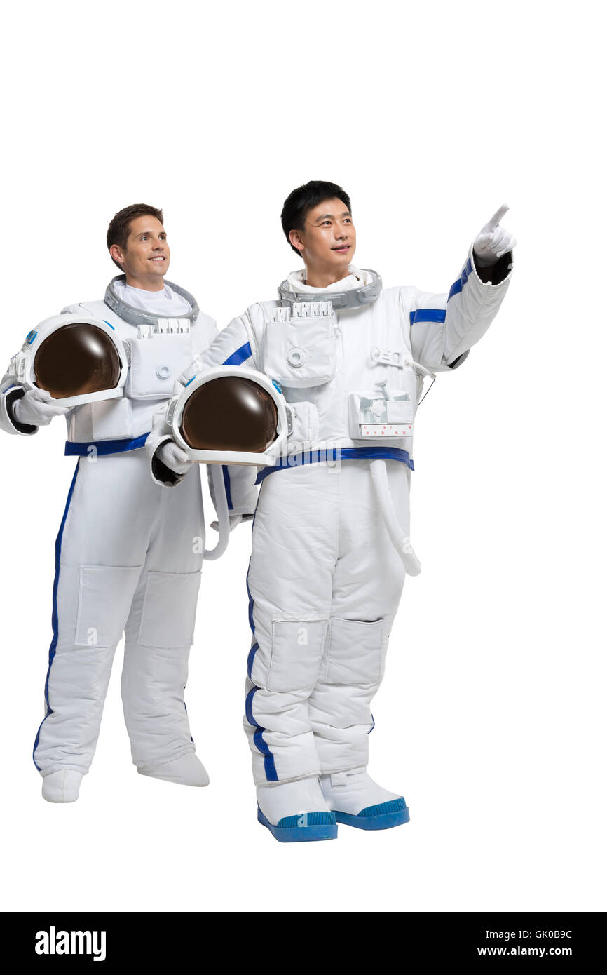 Studio shot two male astronauts Stock Photo - Alamy