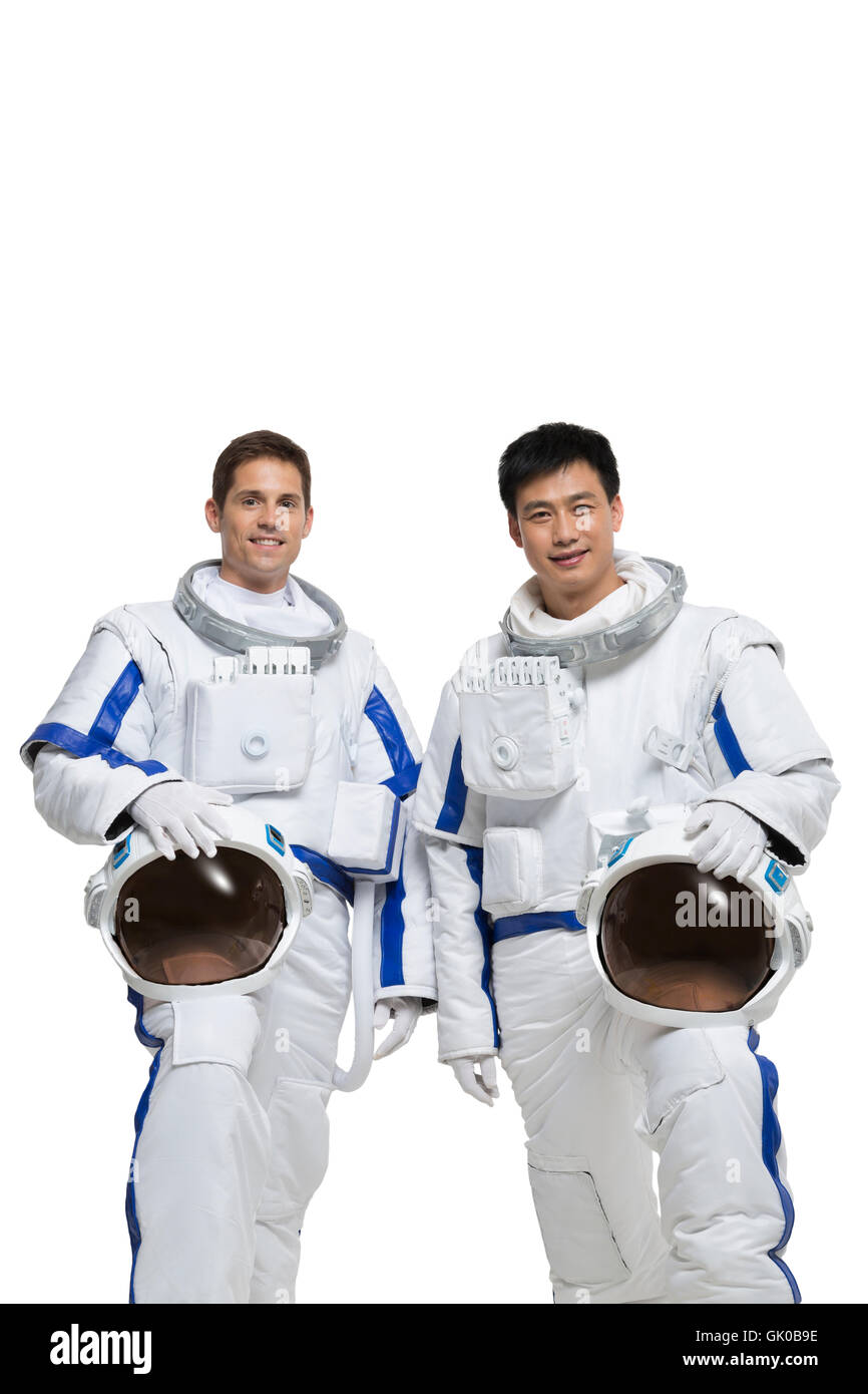 Studio shot two male astronauts Stock Photo - Alamy