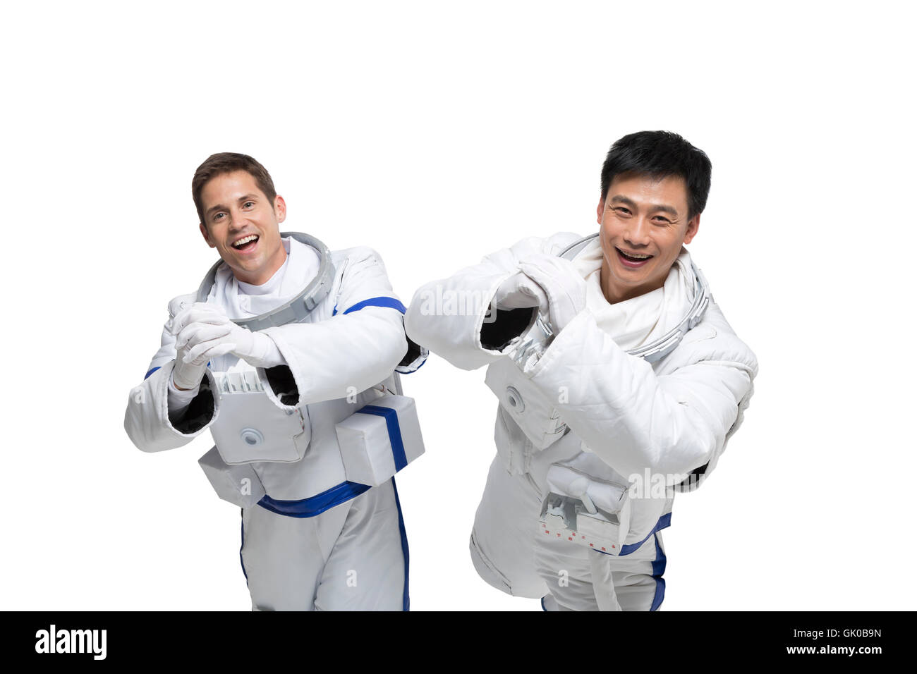 Studio shot two male astronauts Stock Photo - Alamy