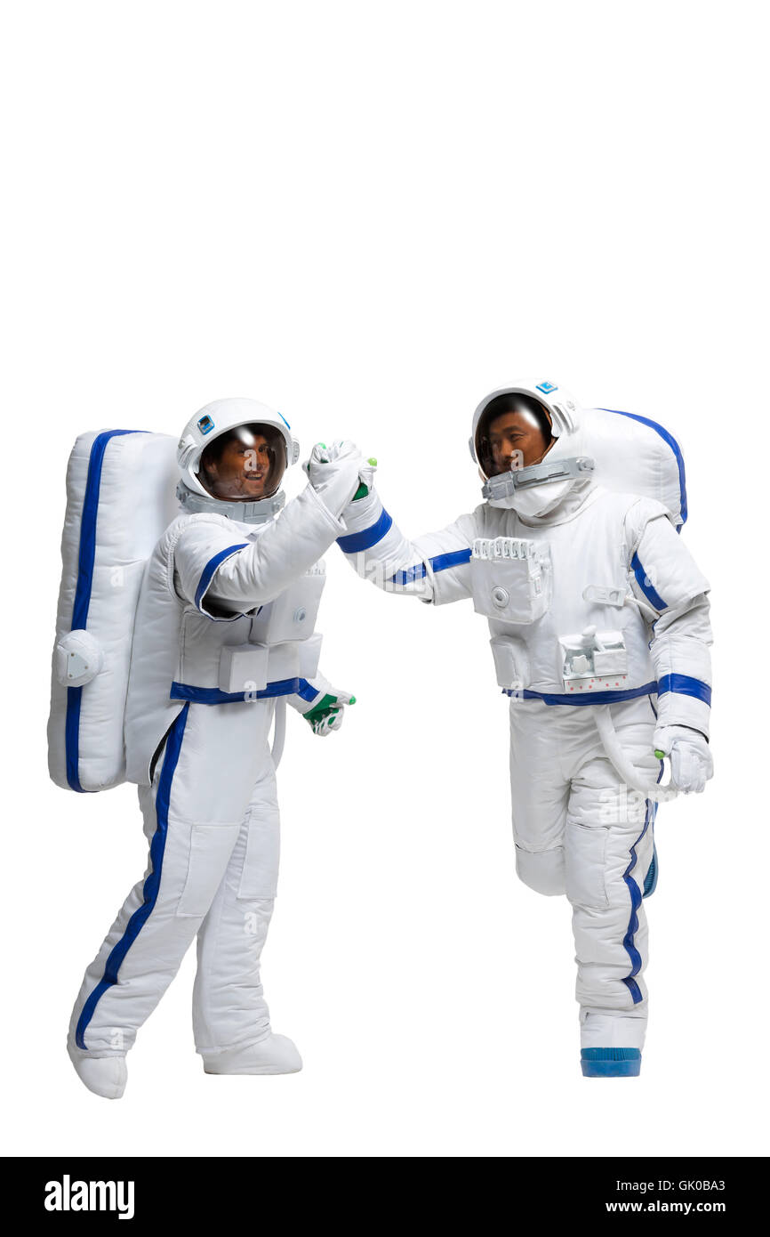 Studio shot two male astronauts Stock Photo - Alamy