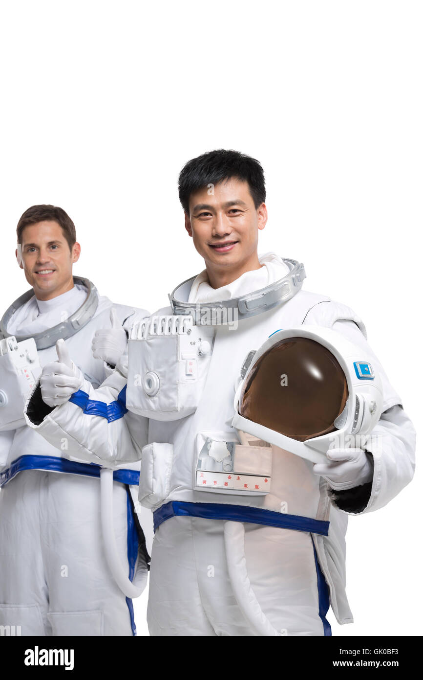 Studio shot male astronauts Stock Photo - Alamy