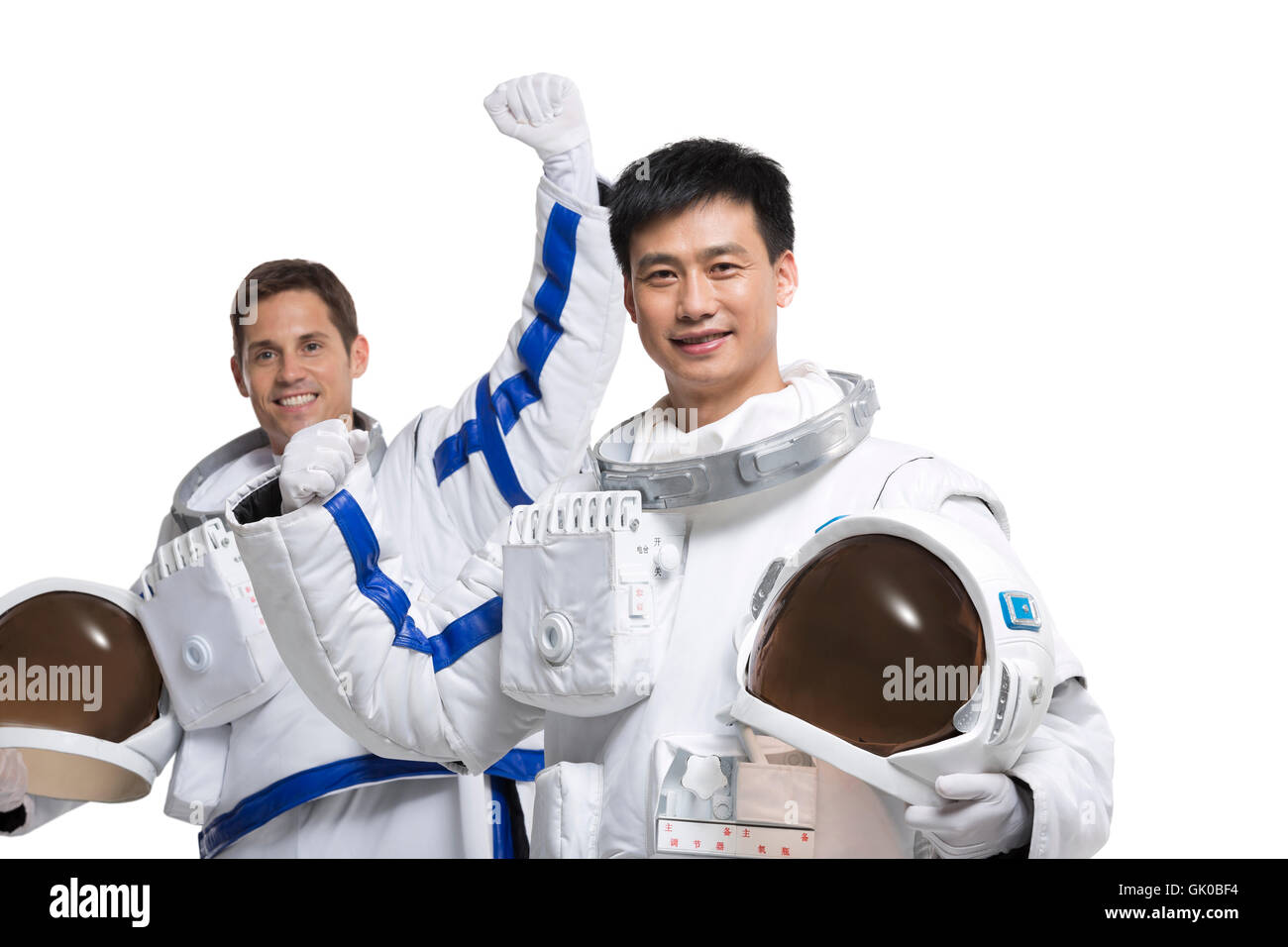 Studio shot male astronauts Stock Photo - Alamy