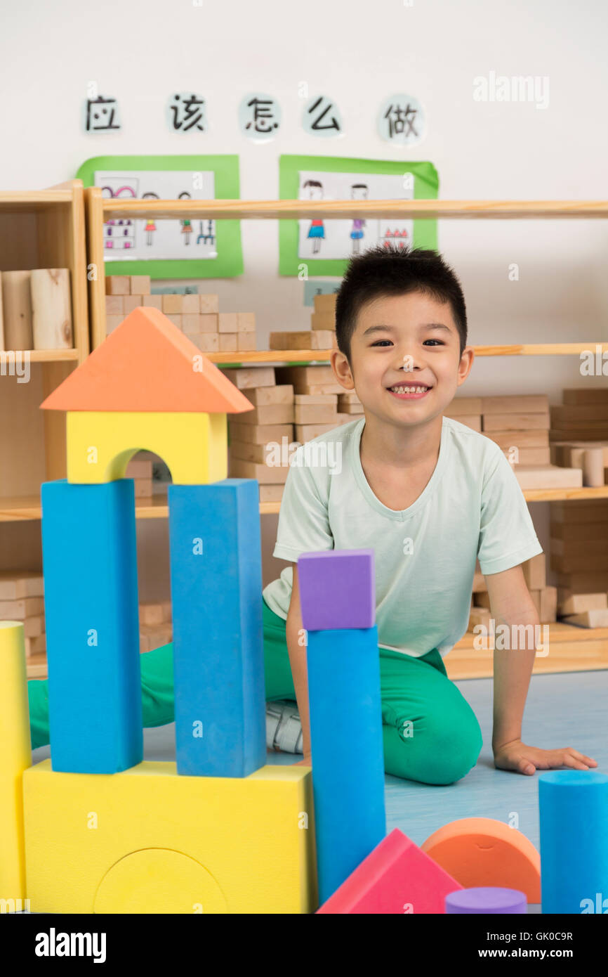 Children playing in kindergarten Stock Photo - Alamy