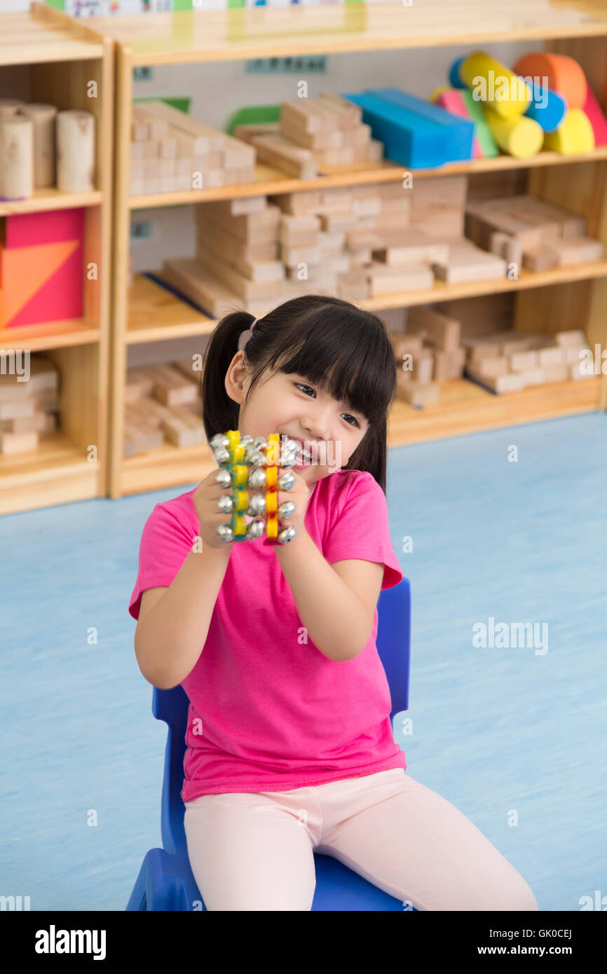 Children playing in kindergarten Stock Photo - Alamy