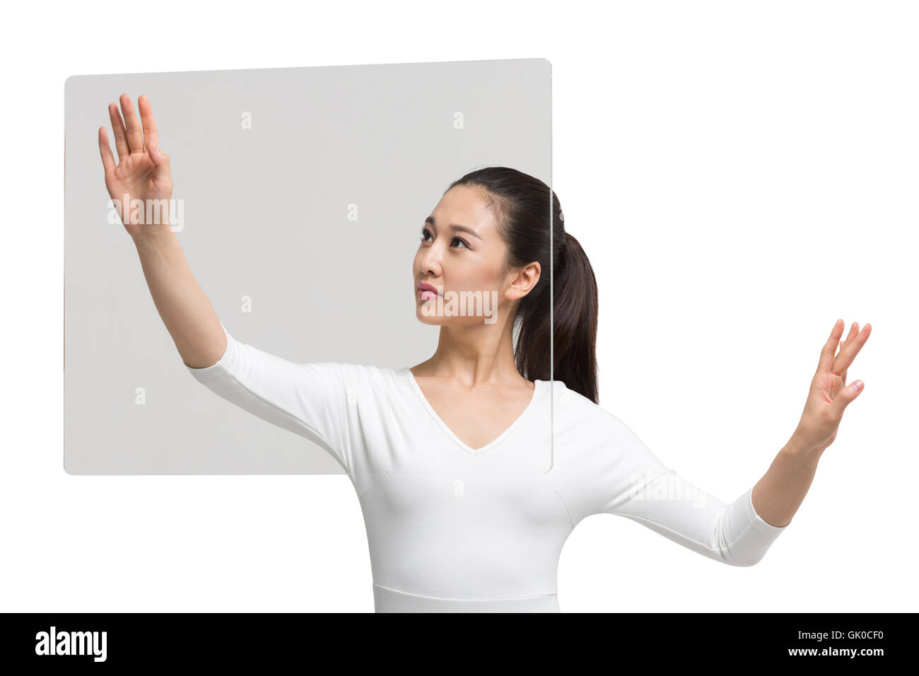 Studio shot of a young woman working in high-tech Stock Photo - Alamy