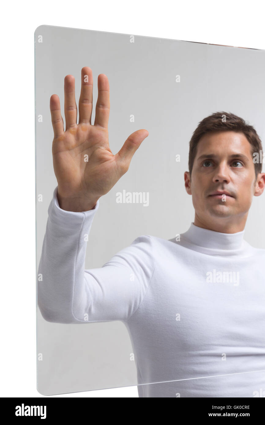 Studio shot of a young man working in high-tech Stock Photo - Alamy
