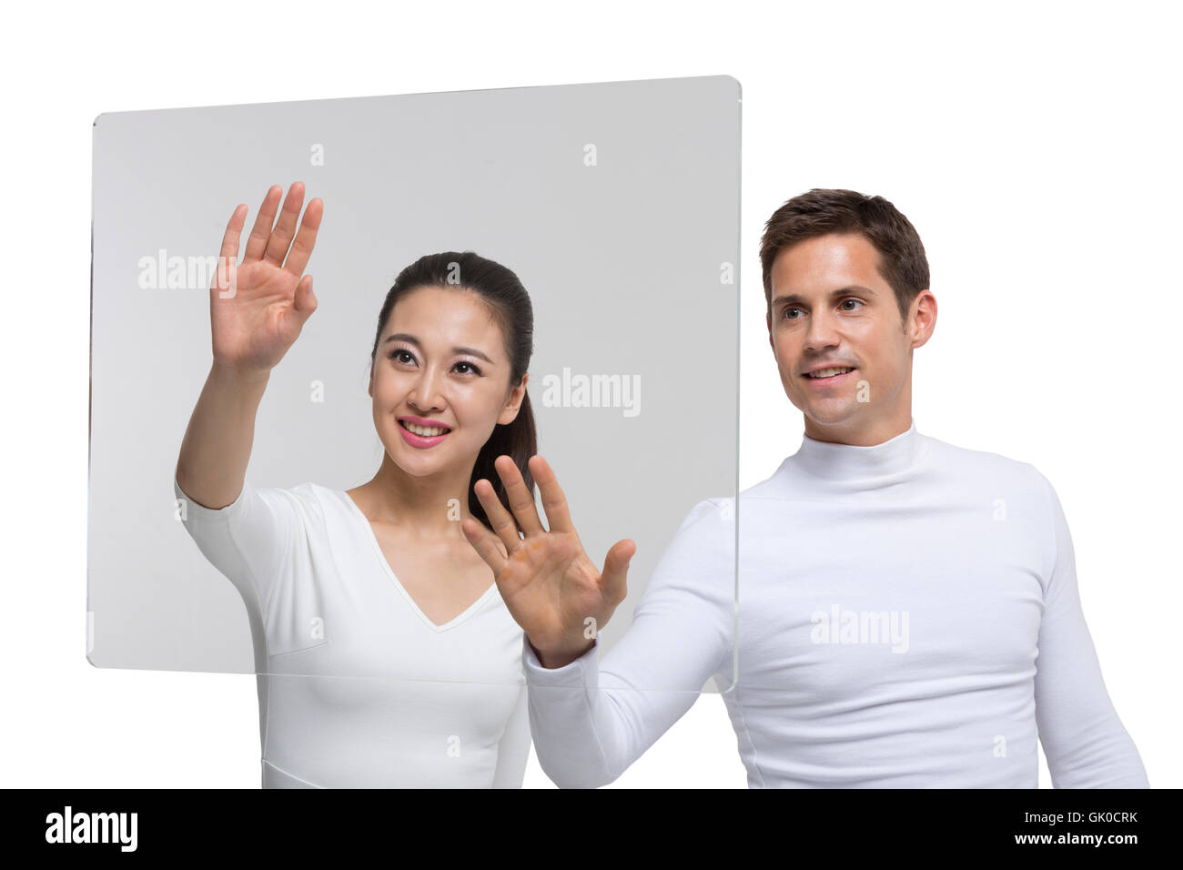 Studio shot young man working in high-tech Stock Photo - Alamy