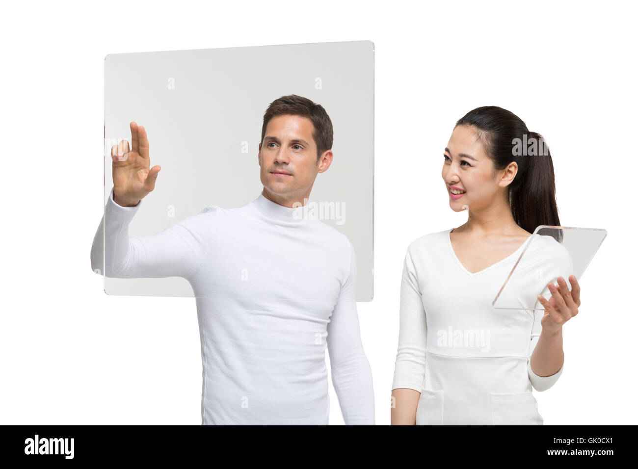 Studio shot young man working in high-tech Stock Photo - Alamy