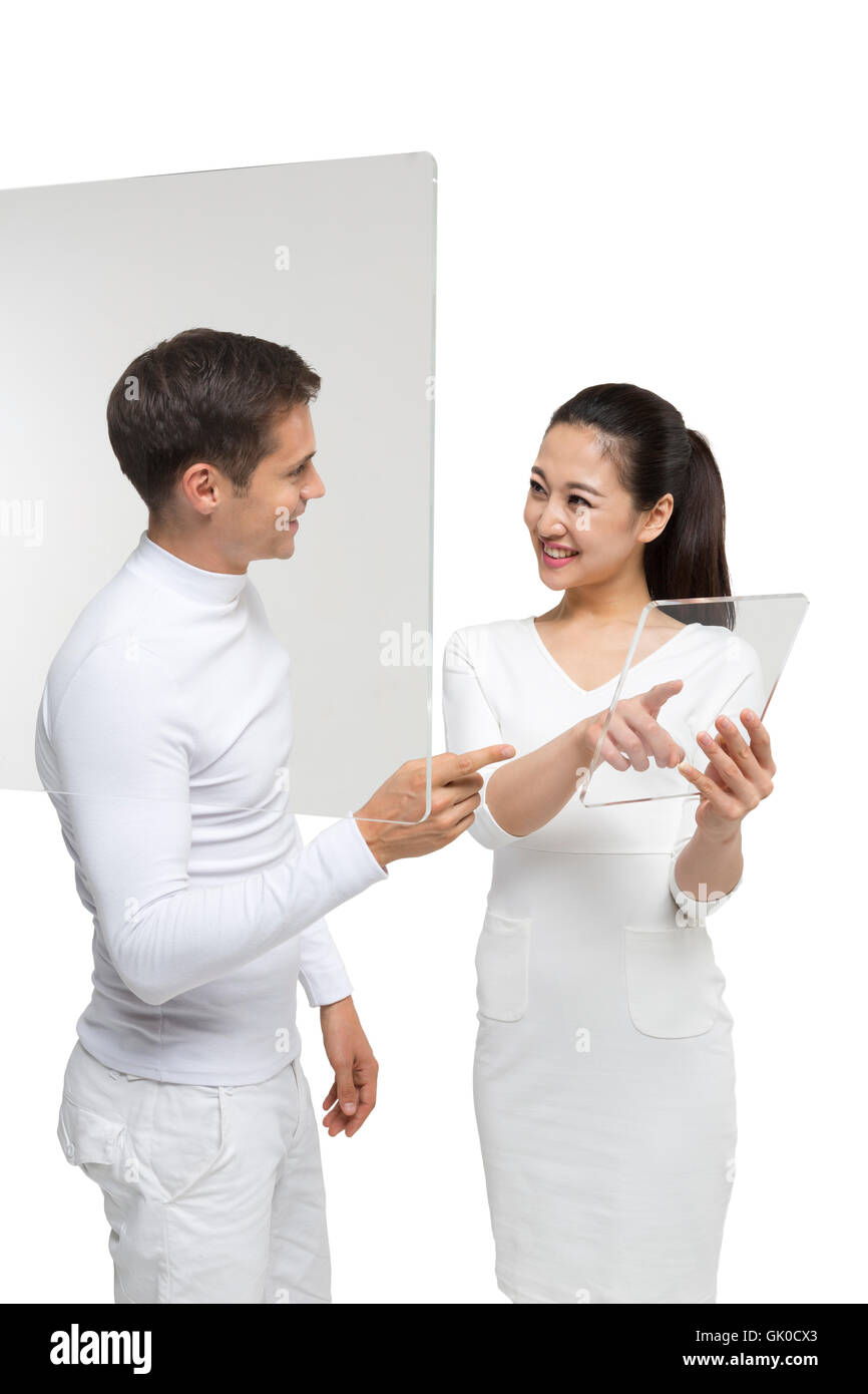 Studio shot young man working in high-tech Stock Photo - Alamy