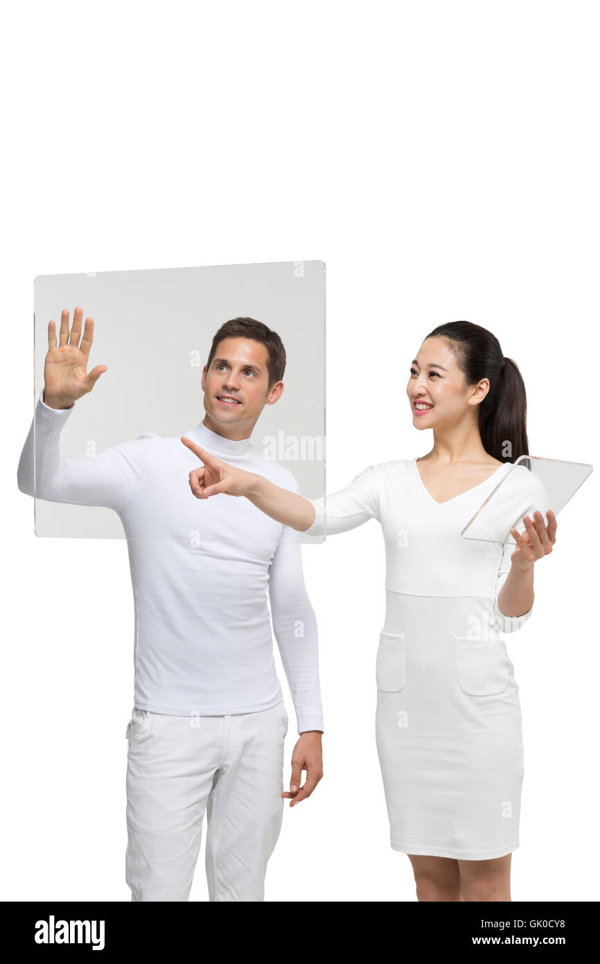 Studio shot young man working in high-tech Stock Photo - Alamy