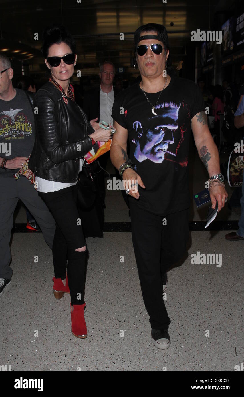 Slash and a female companion at Los Angeles International Airport (LAX ...