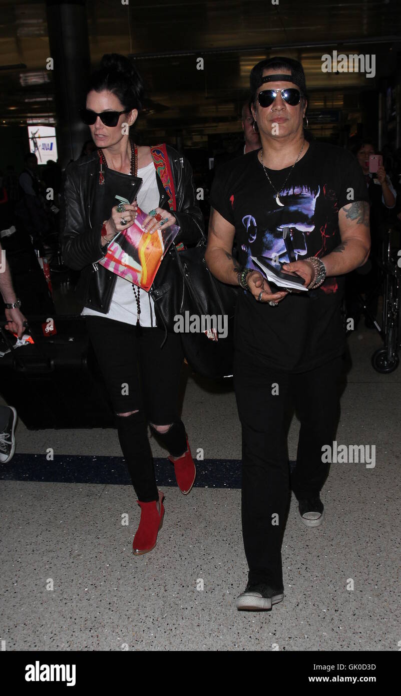 Slash and a female companion at Los Angeles International Airport (LAX ...