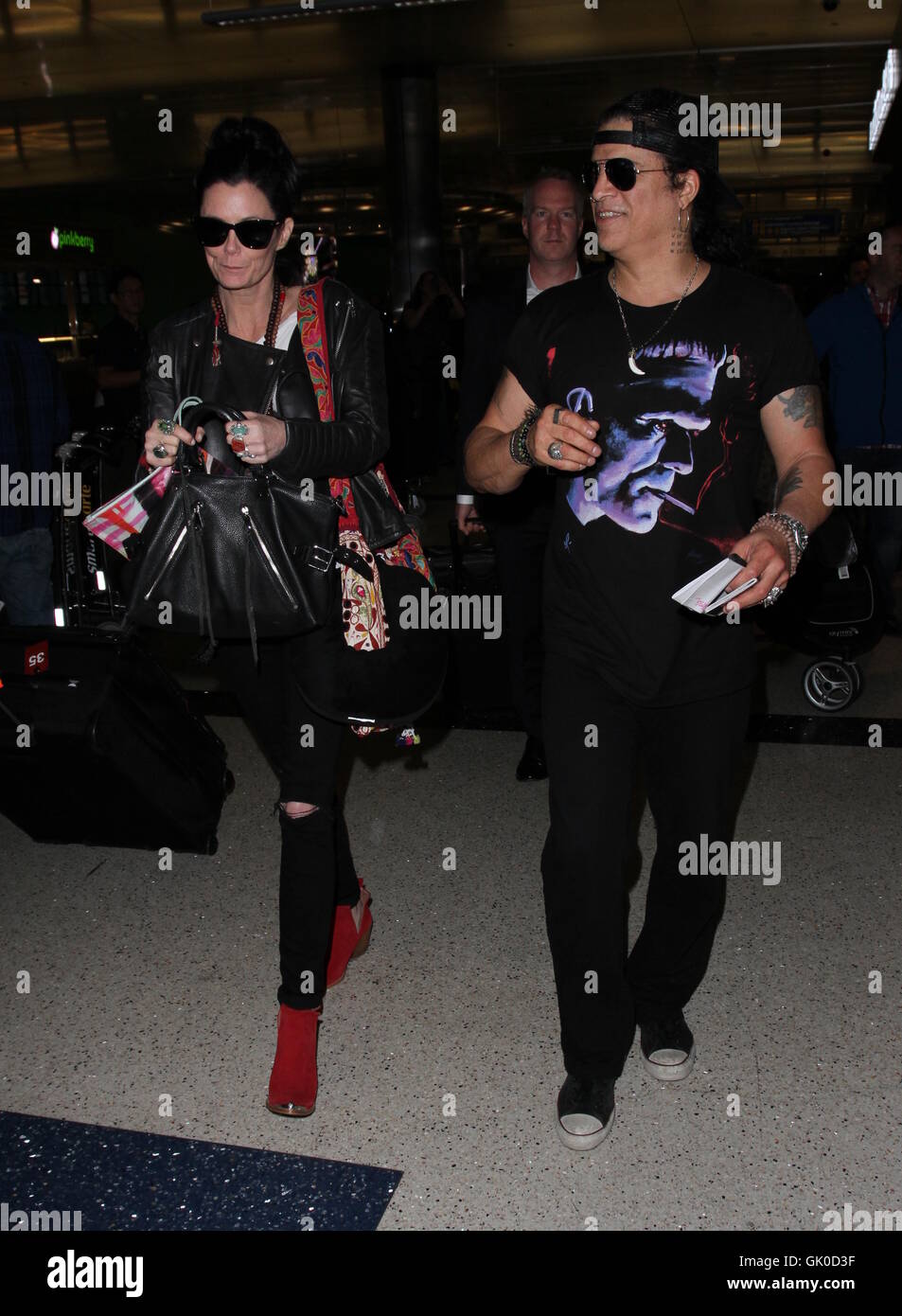 Slash and a female companion at Los Angeles International Airport (LAX ...