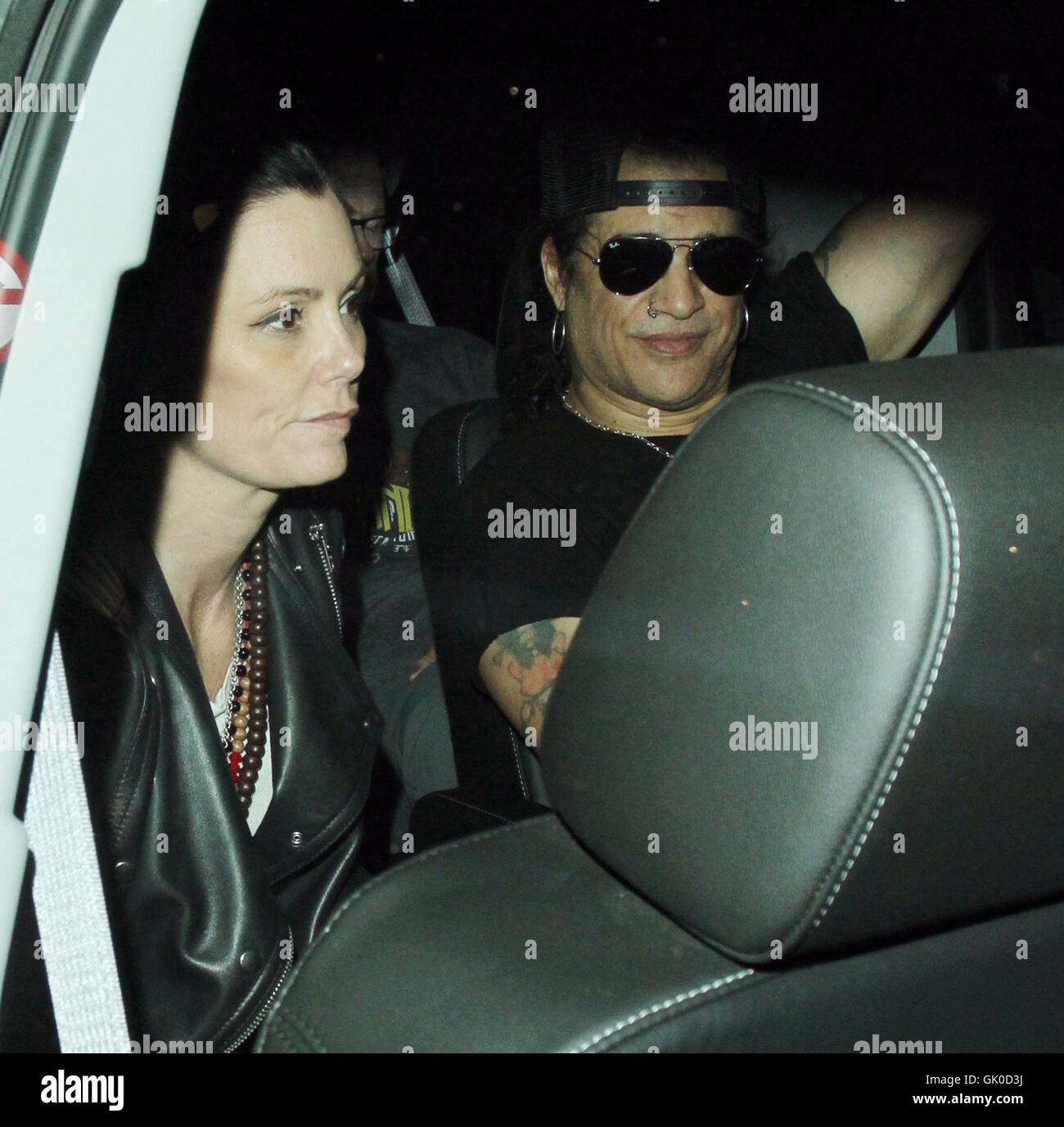 Slash and a female companion at Los Angeles International Airport (LAX ...