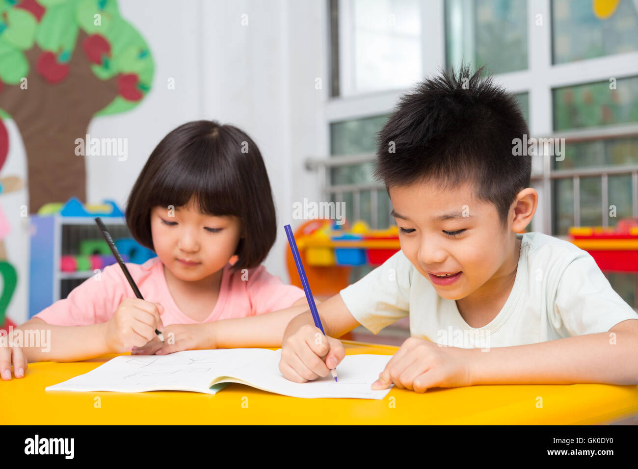 Children playing in kindergarten Stock Photo - Alamy