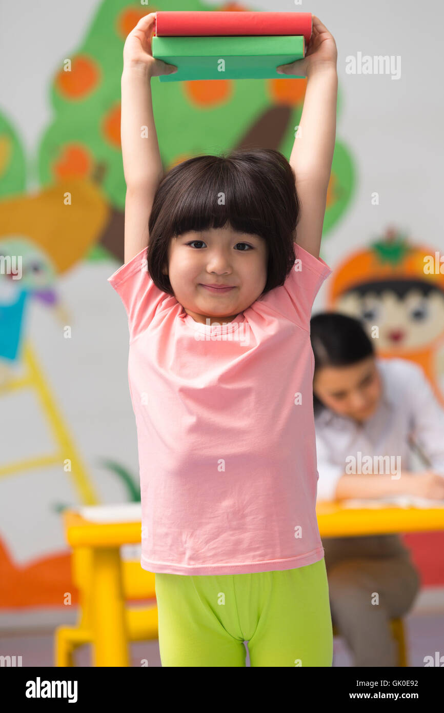 Children playing in kindergarten Stock Photo - Alamy