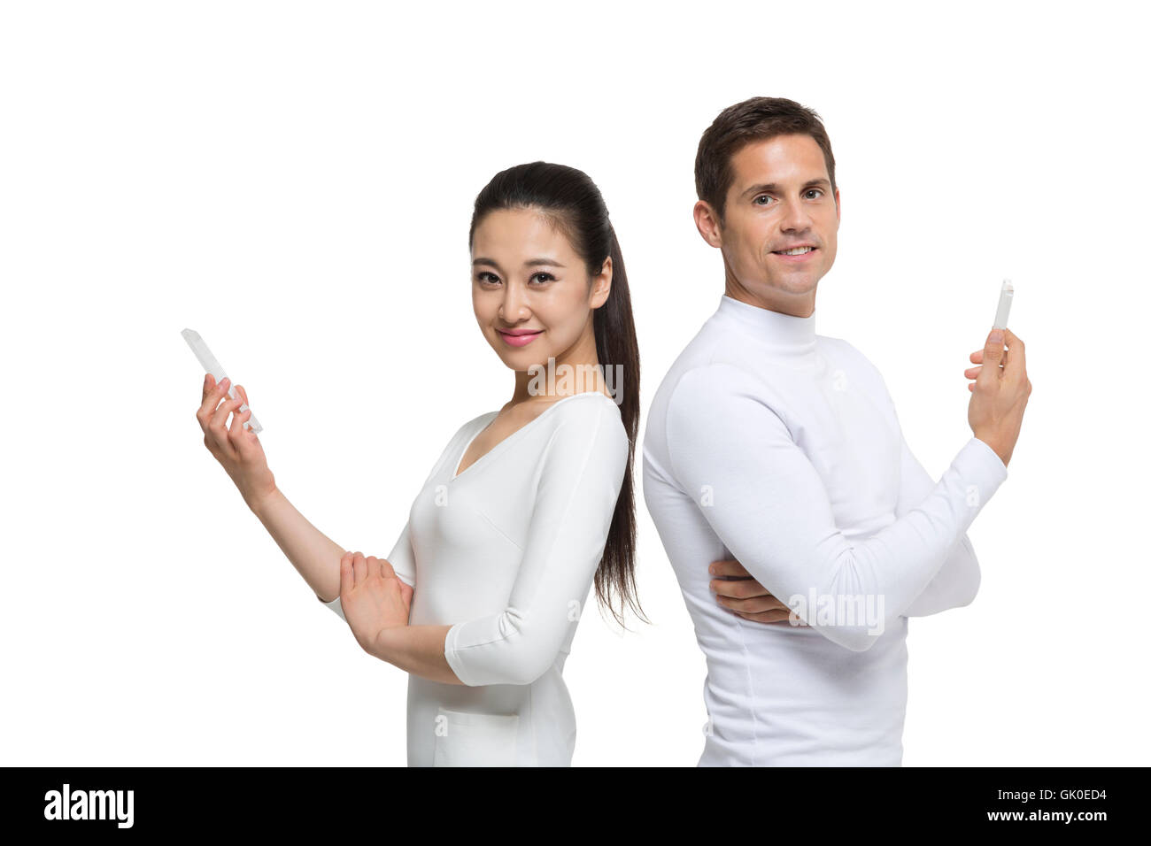 Studio shot young man working in high-tech Stock Photo - Alamy