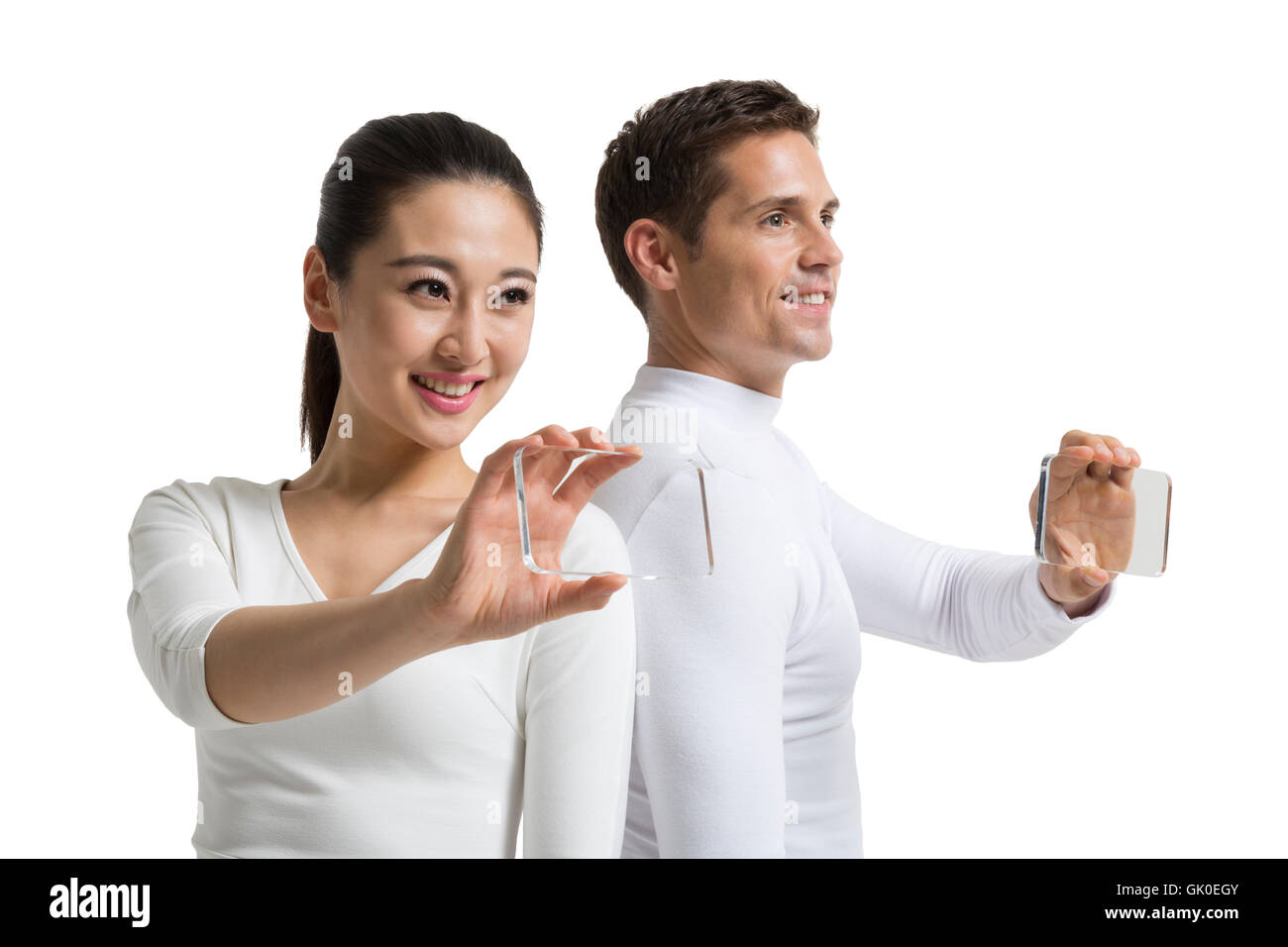 Studio shot young man working in high-tech Stock Photo - Alamy