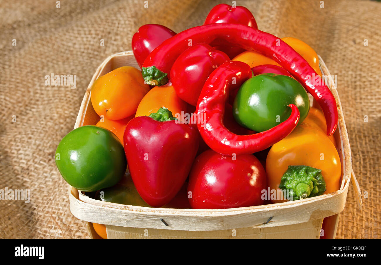 Sweet Peppers in Basket Stock Photo - Alamy