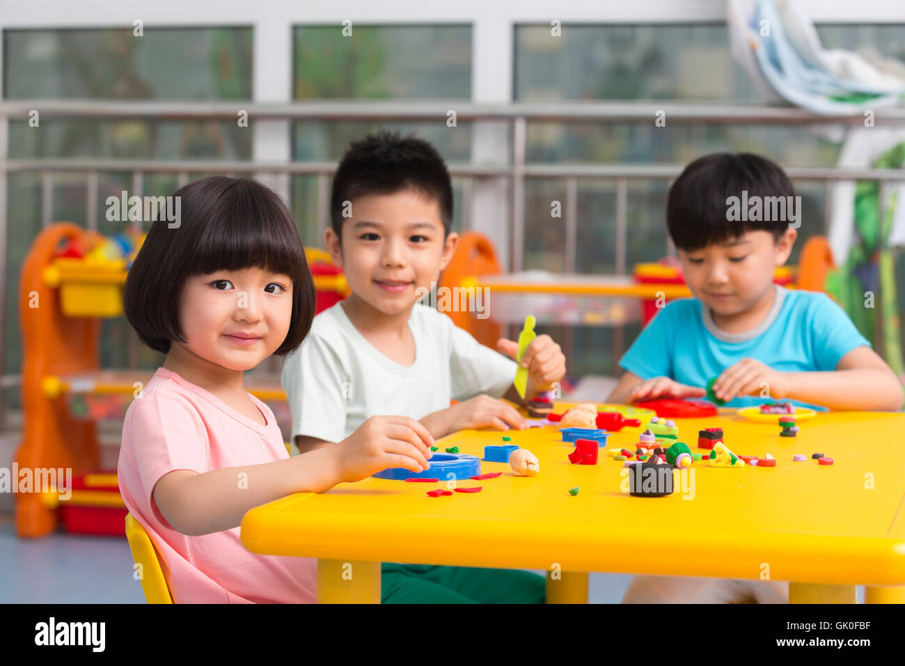 Children playing in kindergarten Stock Photo - Alamy