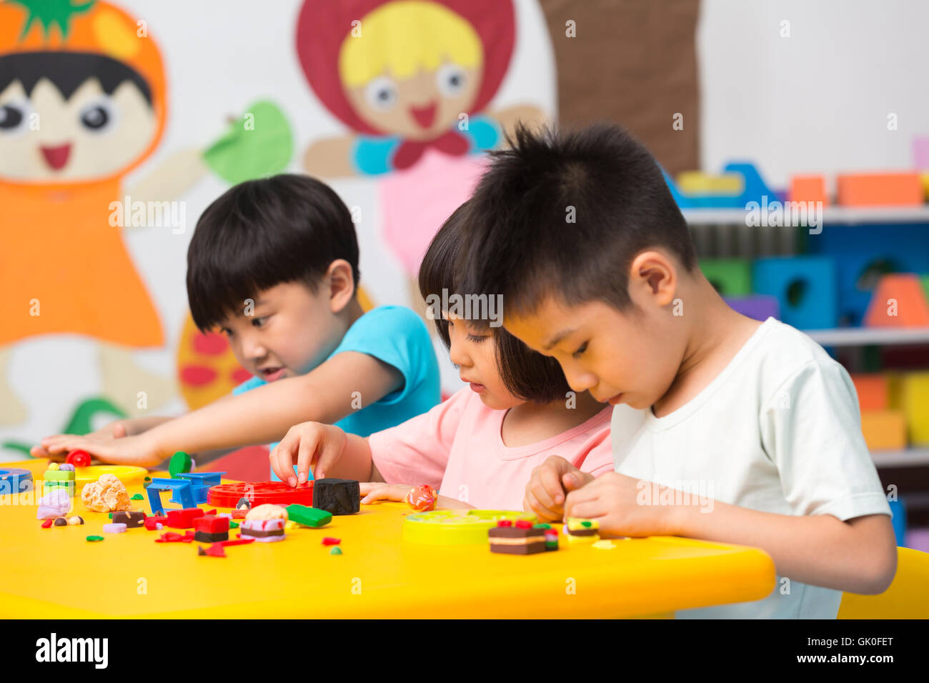 Children playing in kindergarten Stock Photo - Alamy